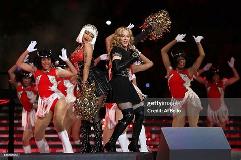 Singer Madonna Performs With Nicki Minaj During The Bridgestone Super