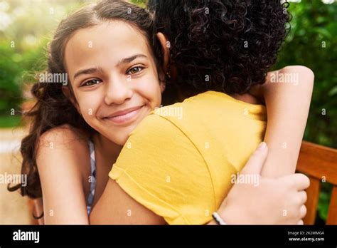 I Love My Mom Cropped Portrait Of An Adorable Young Girl And Her