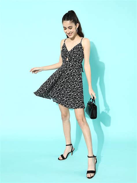 Berrylush Women Black Floral Printed V Neck Front Twist Knot A Line Mi