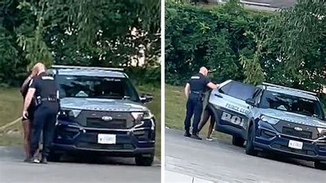 Maryland Cop Caught Allegedly Kissing Young Woman Goes Into Car With