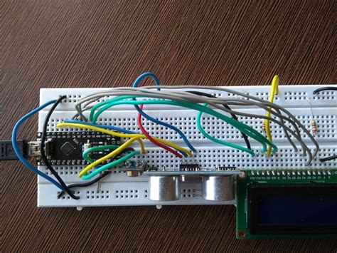 arduino interfacing with ultrasonic sensor and contactless temperature