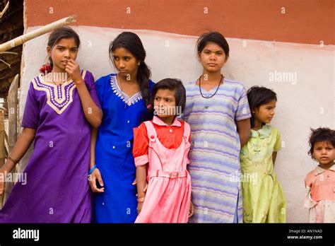 Indian Girls Standing Side By Side In Front Of A Wall India Madhya