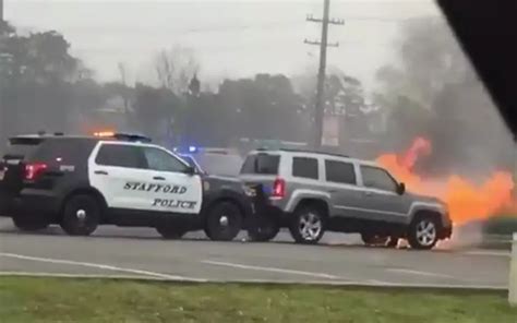 Watch Stafford Cop Car Pushes Flaming Suv From Drive Thru