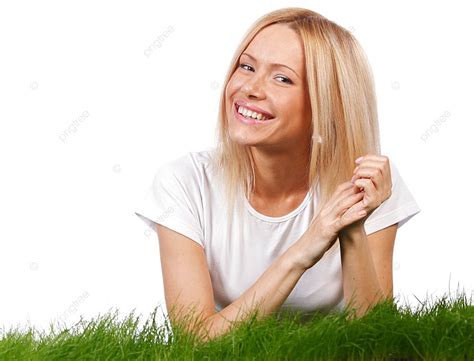 Beautiful Young Blonde Smiling Woman Lying On Grass Background