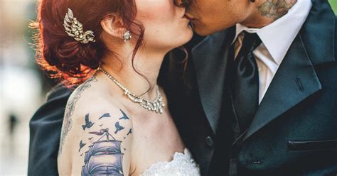 Tattooed Couple Kissing On Their Wedding Day Allebach Photography