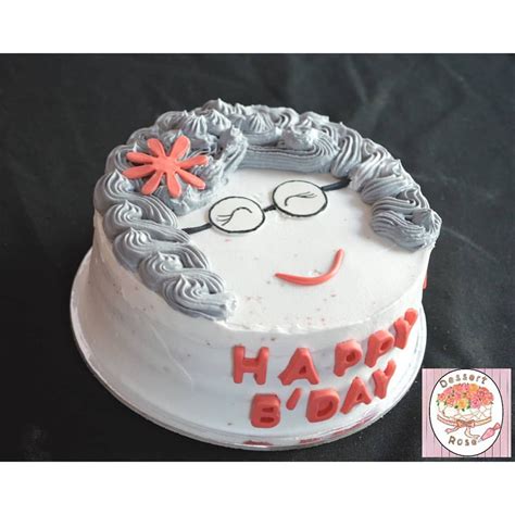 A Birthday Cake Decorated With An Image Of A Womans Face And The Words