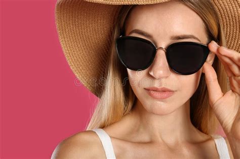 Beautiful Woman In Stylish Sunglasses On Pink Background Closeup Stock