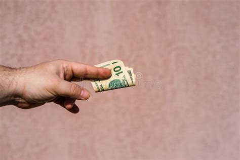Hand Holding Showing Dollars Money And Giving Or Receiving Money Like