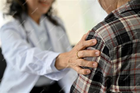 Premium Photo Professional Asian Senior Female Doctor Touches Her