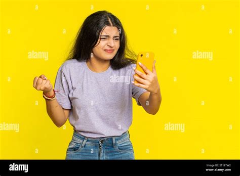 Upset Sad Indian Woman Use Smartphone Typing Browsing Play Game Loses