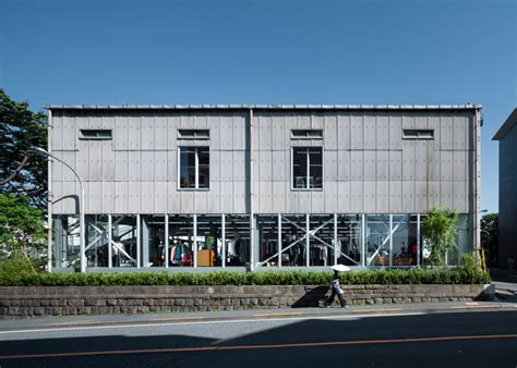 kengo kuma uses a grand staircase to create a shop