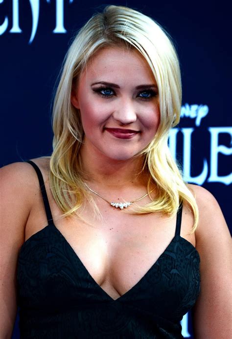 Busty Emily Osment Wearing A Low Cut Black Dress At The Maleficent
