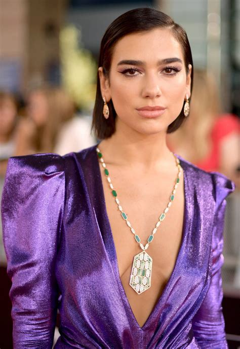 dua lipa unleashes assets in hot gown at billboard awards