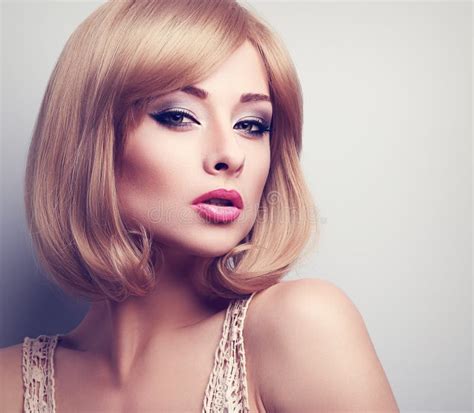 Beautiful Bright Makeup Blond Woman With Short Hair Style Looking Sexy
