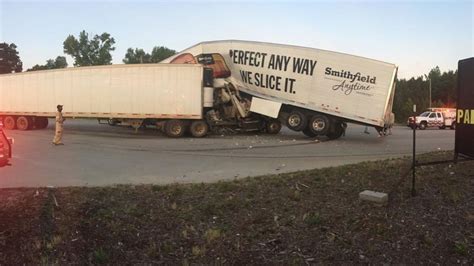Truck Driver Has Minor Injuries After This Incredible Crash