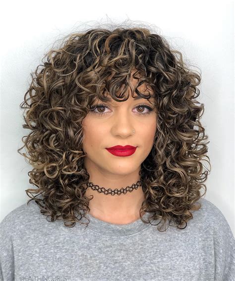 16 Best Ways To Have Curly Hair With Bangs In 2021