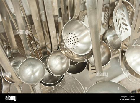 Ladles Slotted Spoon Kitchen Tools In An Industrial Kitchen Germany