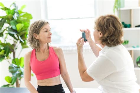 Image result for Woman Using Inhaler