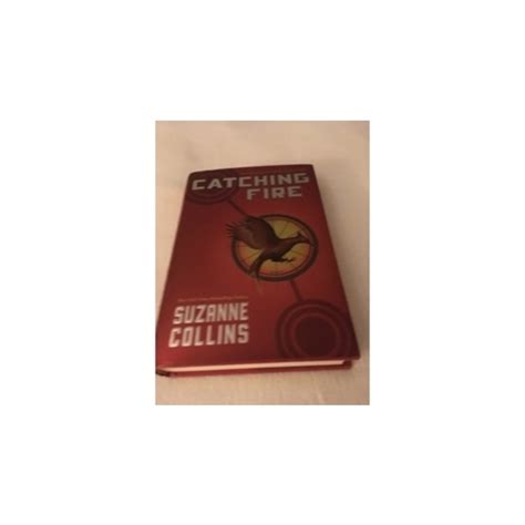 catching fire: a novel by Suzanne Collins, - The Book Chateau ,USED