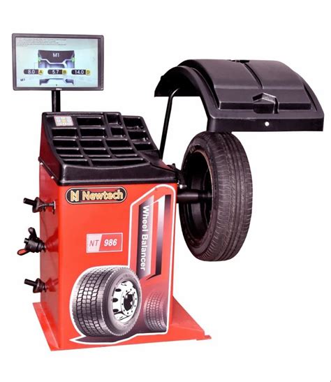 Image result for Computerized Wheel Balancing Machine