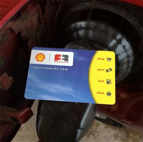 Image result for Shell Cashier Promoting Fuel Rewards