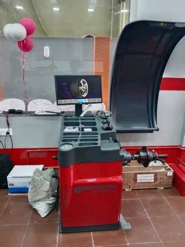 Image result for Computerized Wheel Balancing Machine