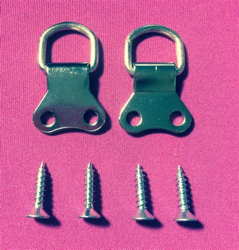 Image result for Fixing D Clips to Picture Frame