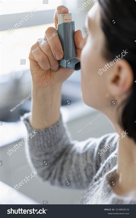 Image result for Woman Using Inhaler
