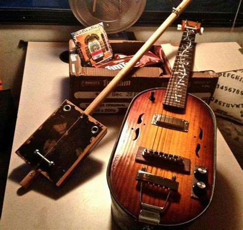 Image result for One String Guitar Instrument