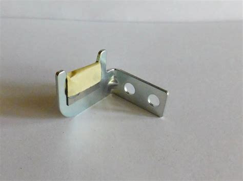 Image result for Stamped Over Center Spring