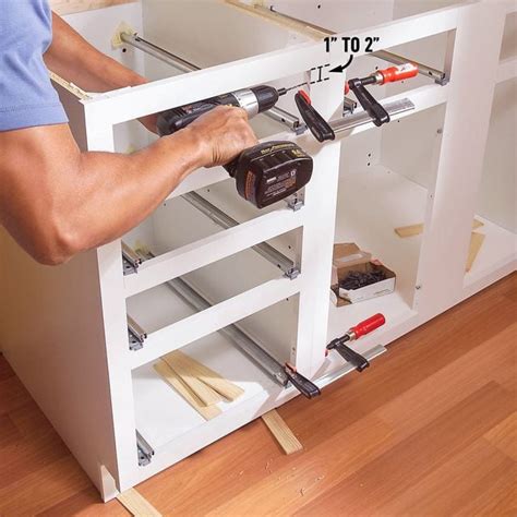 Image result for Installing Kitchen Cabinets