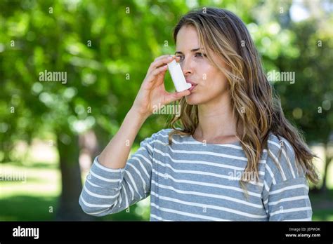 Image result for Woman Using Inhaler