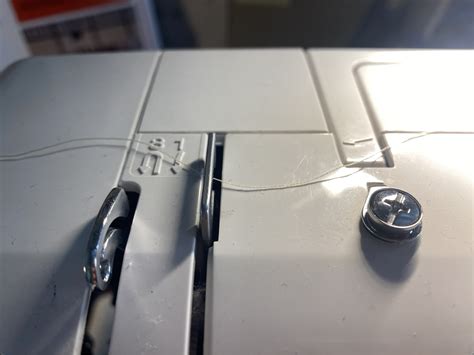 Image result for Threading a Sewing Machine Needle