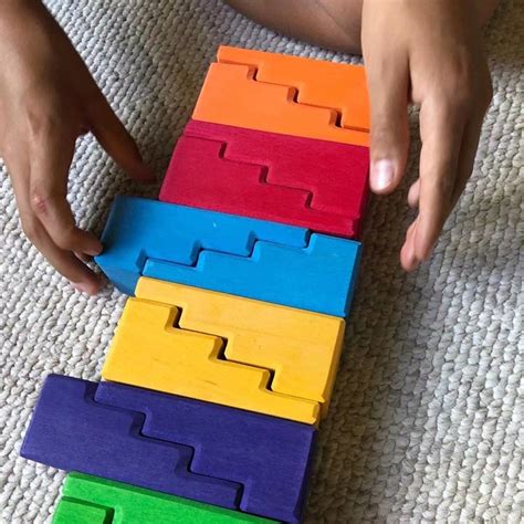 Image result for Children Building Blocks Using a Ladder