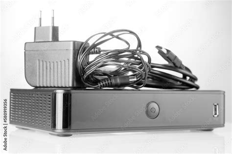 TV set-top box prepared for installation, digital TV kit on white ...