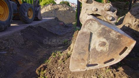 Image result for Backhoe Digging