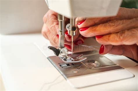 Image result for Threading a Sewing Machine Needle