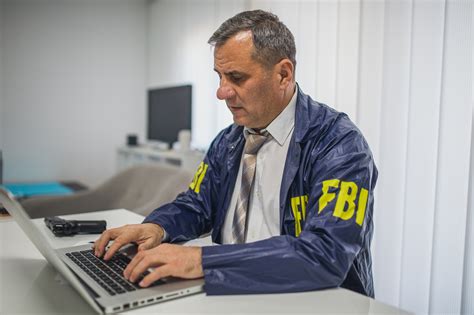 Image result for Federal Agent Typing On a Computer