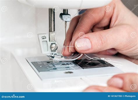 Image result for Threading a Sewing Machine Needle