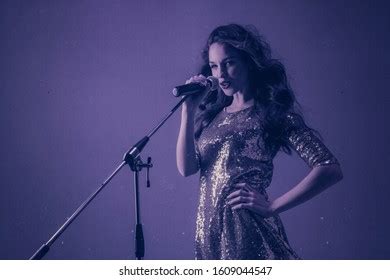 Image result for Singer Simple Purple