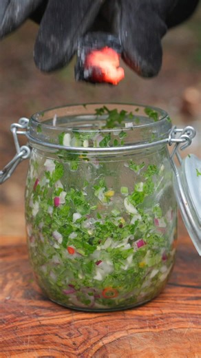Searing marbled meat and toasting white rice over an open fire in a tranquil woodland retreat. A rich, velvety onion sauce complements the perfectly crisp elements, followed by a refreshingly bright drink infused with aromatic smoke. #OutdoorCooking #OpenFire #WoodlandRetreat #Cooking | Cook Loop