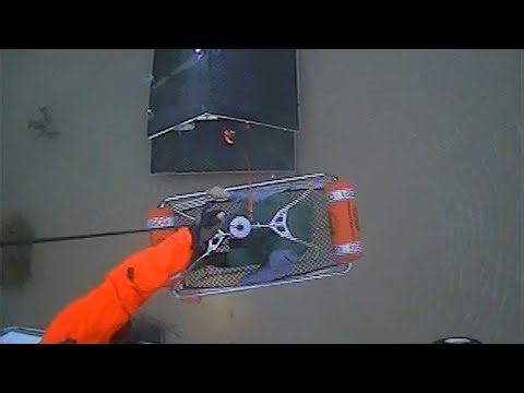 USCG Aircrew Recues Two From Flooded Home
