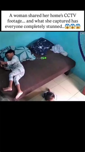 creepy tales daily on Instagram: "A woman shared CCTV footage from inside her home, and it has shocked thousands online. The video shows a terrifying moment when two of her children were inside their room. The older brother was using his phone, while the younger girl was watching TV. Suddenly, the little girl seemed to be pulled under the bed by an unseen force. She cried in fear, and her brother—whose leg was swollen—couldn’t help her. He immediately shouted for help. Their grandmother rushed i
