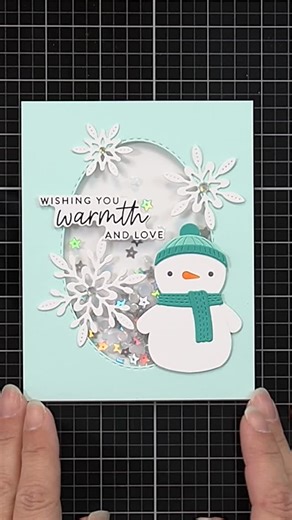 Mindy Eggen on Instagram: "Simple Shaker Card Tutorial . There is a full instructional tutorial on YouTube including supplies used but for quick reference I’m using : ➡️ Snuggle Snowman Wafer Die ➡️ Nested Stitched Ovals Die ➡️ Splendid Snowflakes Wafer Die ➡️ Cozy in the Cold Stamp Set #cardmaking #diy #diycrafting #shakercard"
