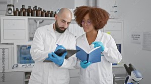 In the heart of the lab, two resolute scientists, checklist in hand, delve into a medical mystery, jotting observations and reading essential research from a book.