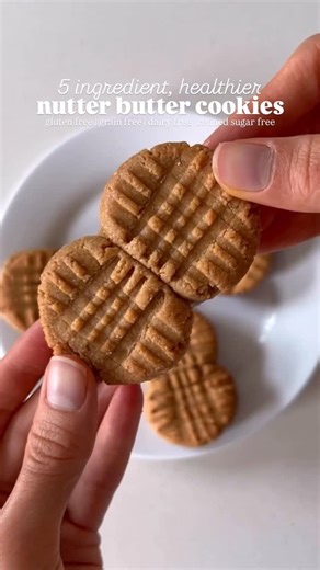 Ruth Anne Bigley on Instagram: "5-Ingredient Nutter Butters! These homemade Nutter Butters are gluten- and grain-free, dairy-free, vegan, and even refined sugar-free. They’re incredibly easy to make and so delicious! Cookies •1 cup almond flour (or substitute ¾ cup oat flour) •½ cup natural peanut butter •¼ cup pure maple syrup (or substitute honey) •1 tsp pure vanilla extract •¼ tsp salt Filling •3 tbsp natural peanut butter •1 tbsp pure maple syrup (or substitute honey) Instructions 1. Add all
