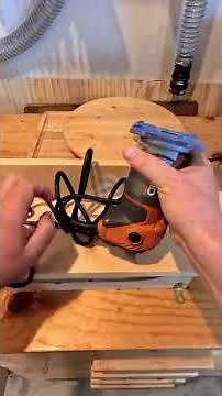 Ridgid trim router bit loading in action