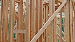 Timber frame house, real estate. stick built home under construction build with wooden truss, post and beam framework.