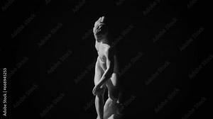 Discobolus (Discus thrower) Greek marble sculpture by Myron, rotating on black background