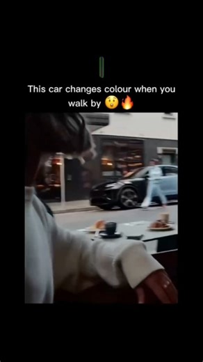 :) on Instagram: "#colorshiftcar – The reel shows a regular-looking car parked on the street… until someone walks past it. In an instant, the entire surface changes color — shifting from dark to bright like the body is made of living pixels. No buttons, no remote… just motion-triggered tech reacting to whoever walks by. – That split-second transformation is what’s sending the clip viral today. People can’t believe paint can behave like a screen, using electronic pigments to switch shades with li